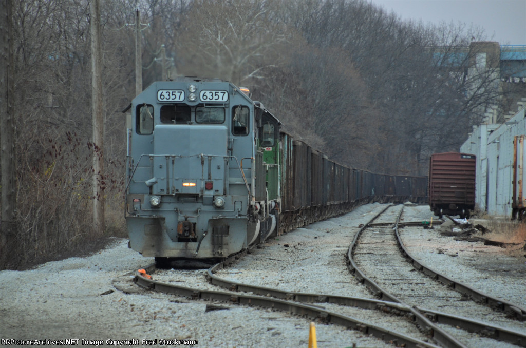 WE 6357 adds to the gloom in her stealth suit.